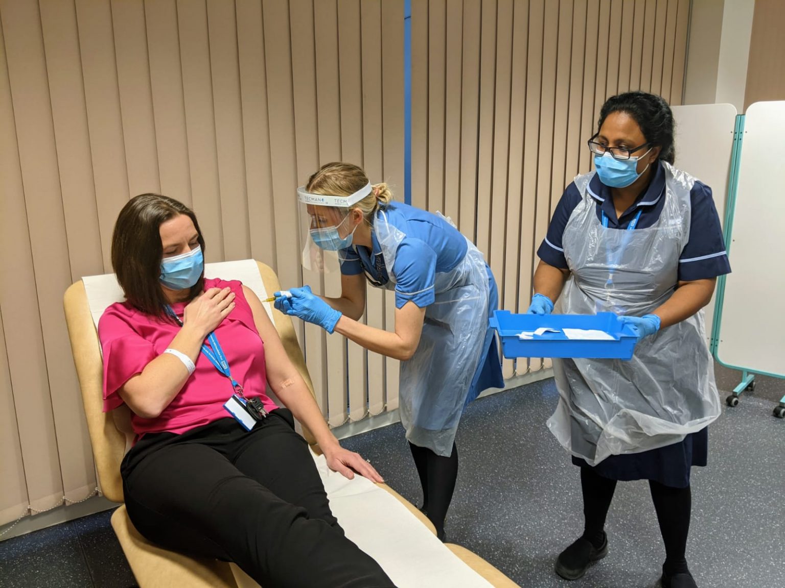Claire receives her first dose - Withington Community Hospital